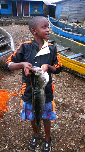 Child-with-Fish-290 - Circle of Blue